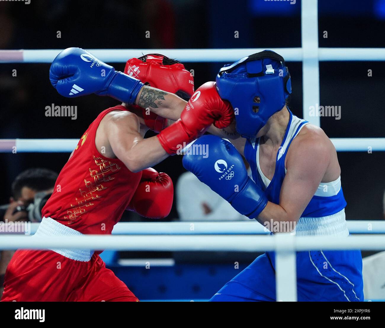 Kazakhstan’s Nazym Kyzaibay (right) in action against China’s Yu Wu during the Women’s 50kg Semi ...