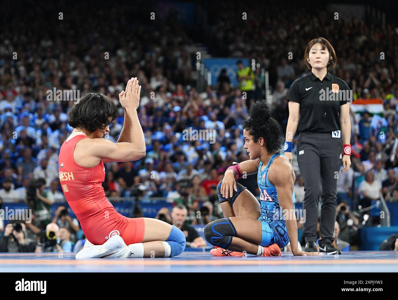 Paris, France. 6th Aug, 2024. Vinesh Vinesh (L) of India celebrates ...