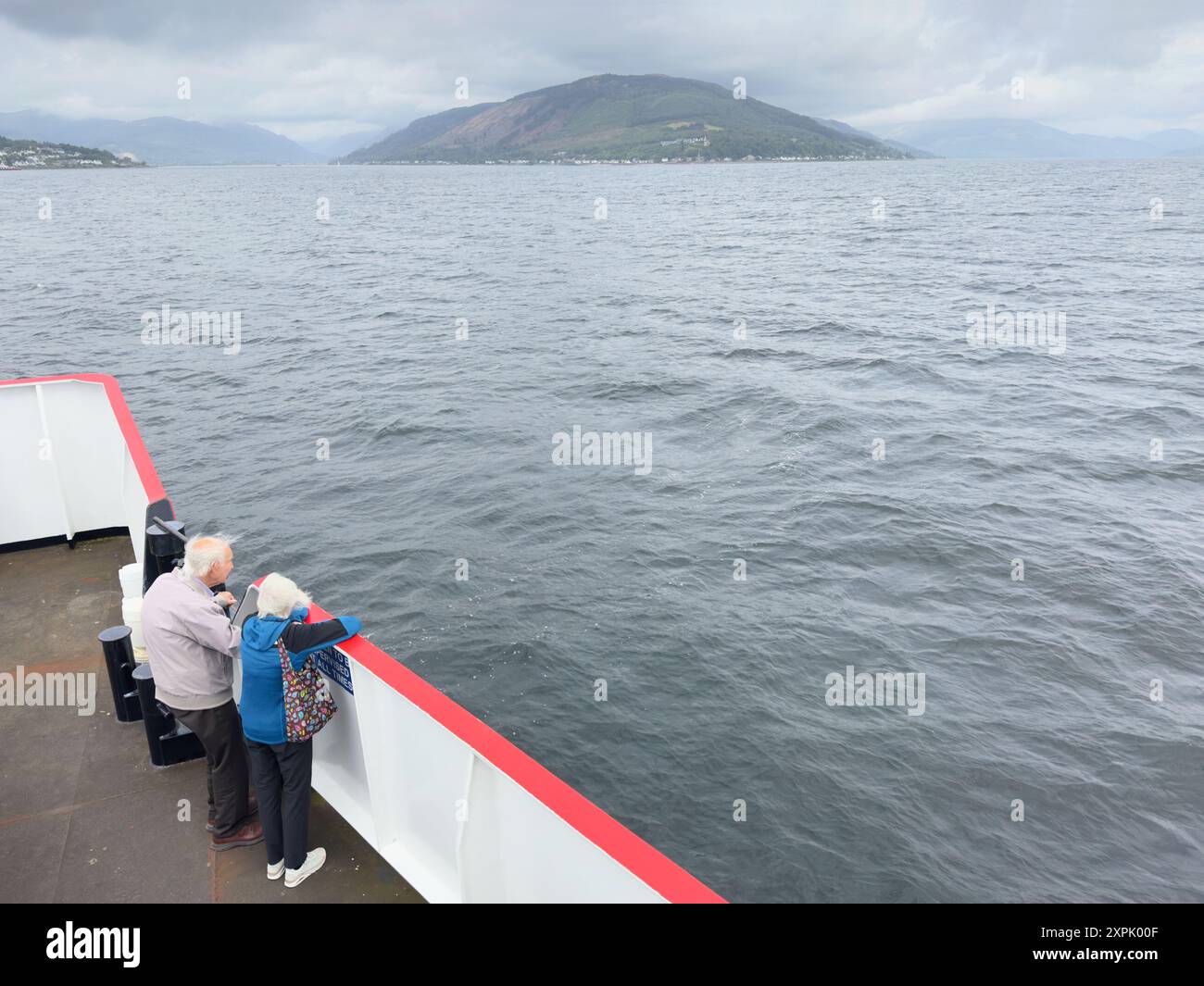 Senior couple onboard ferry sailing from Gourock to Dunoon Stock Photo ...