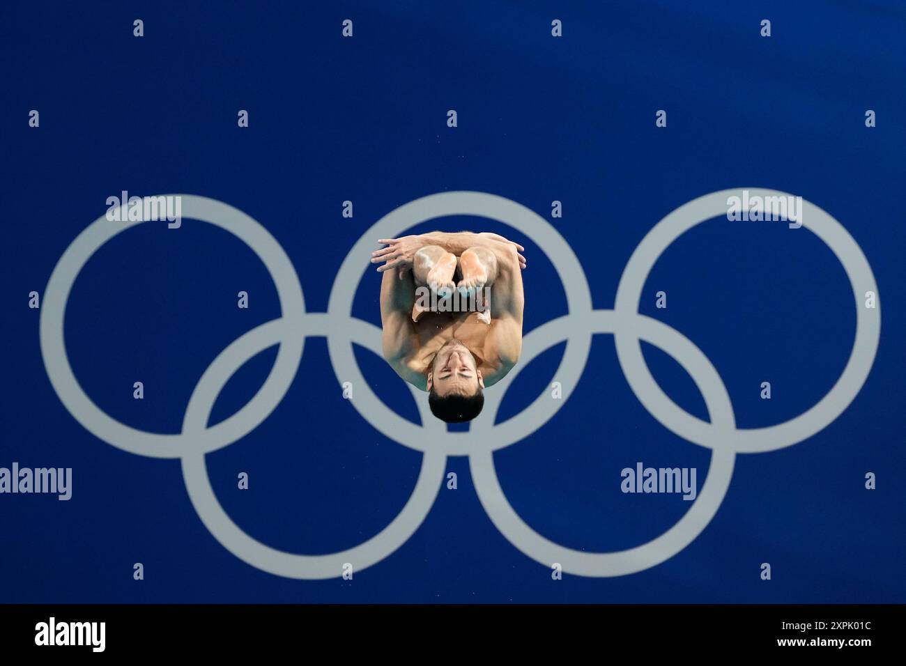 Italy's Giovanni Tocci competes in the men's 3m springboard diving ...