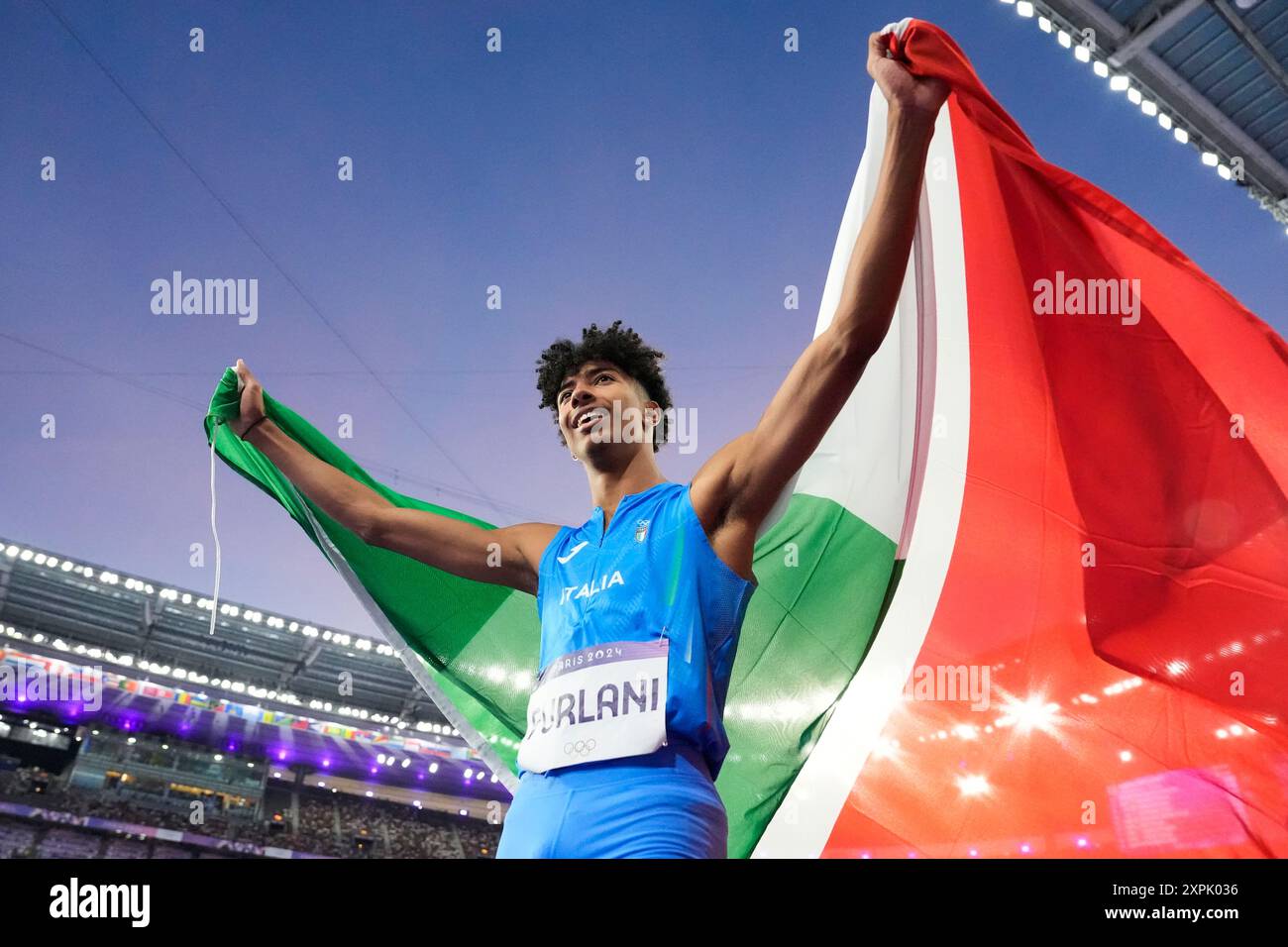 Mattia Furlani, of Italy, celebrates after third place during the men's ...