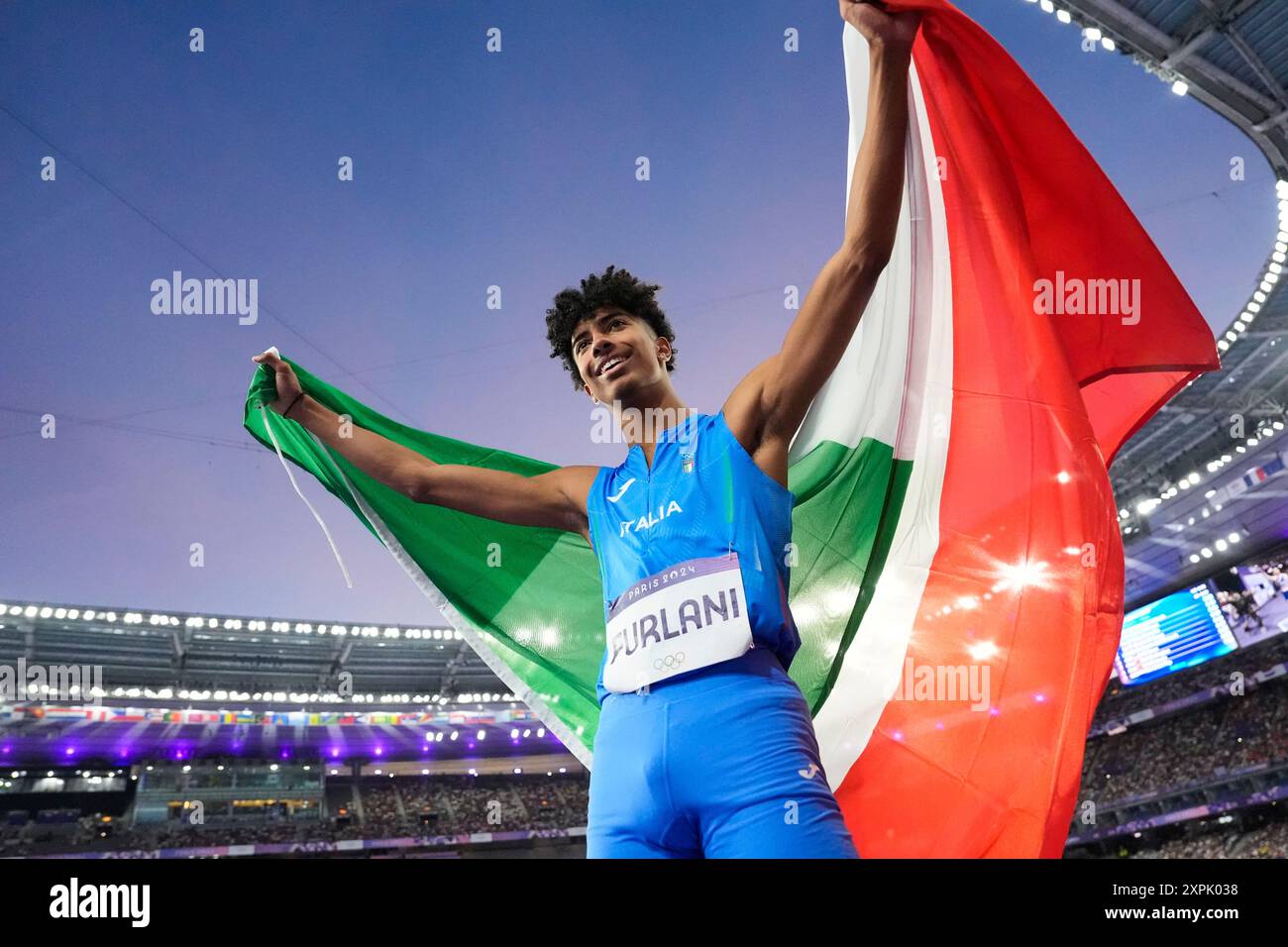 Mattia Furlani, of Italy, celebrates third place during the men's long ...