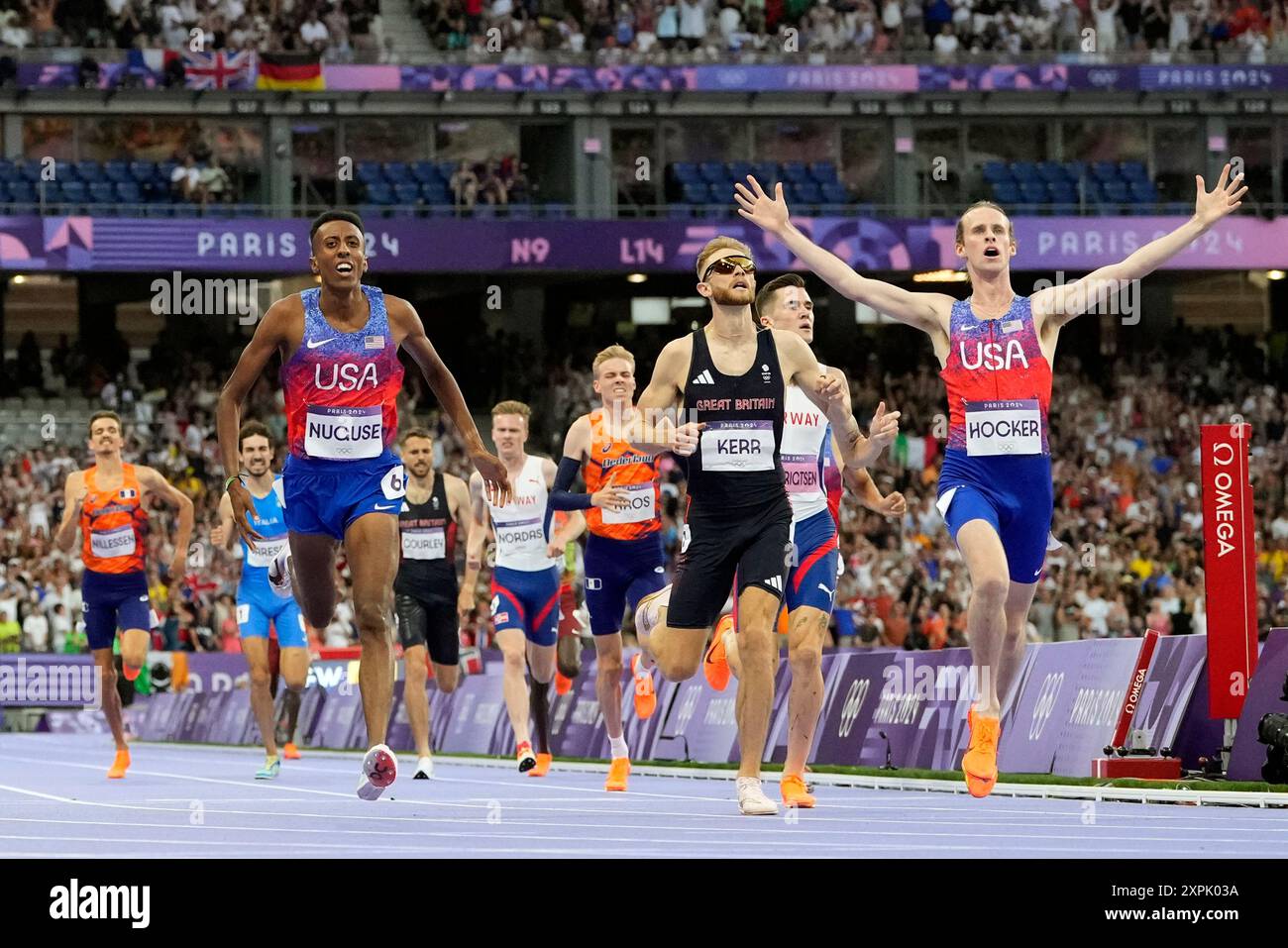 Cole Hocker, of the United States, celebrates after winning the men's ...