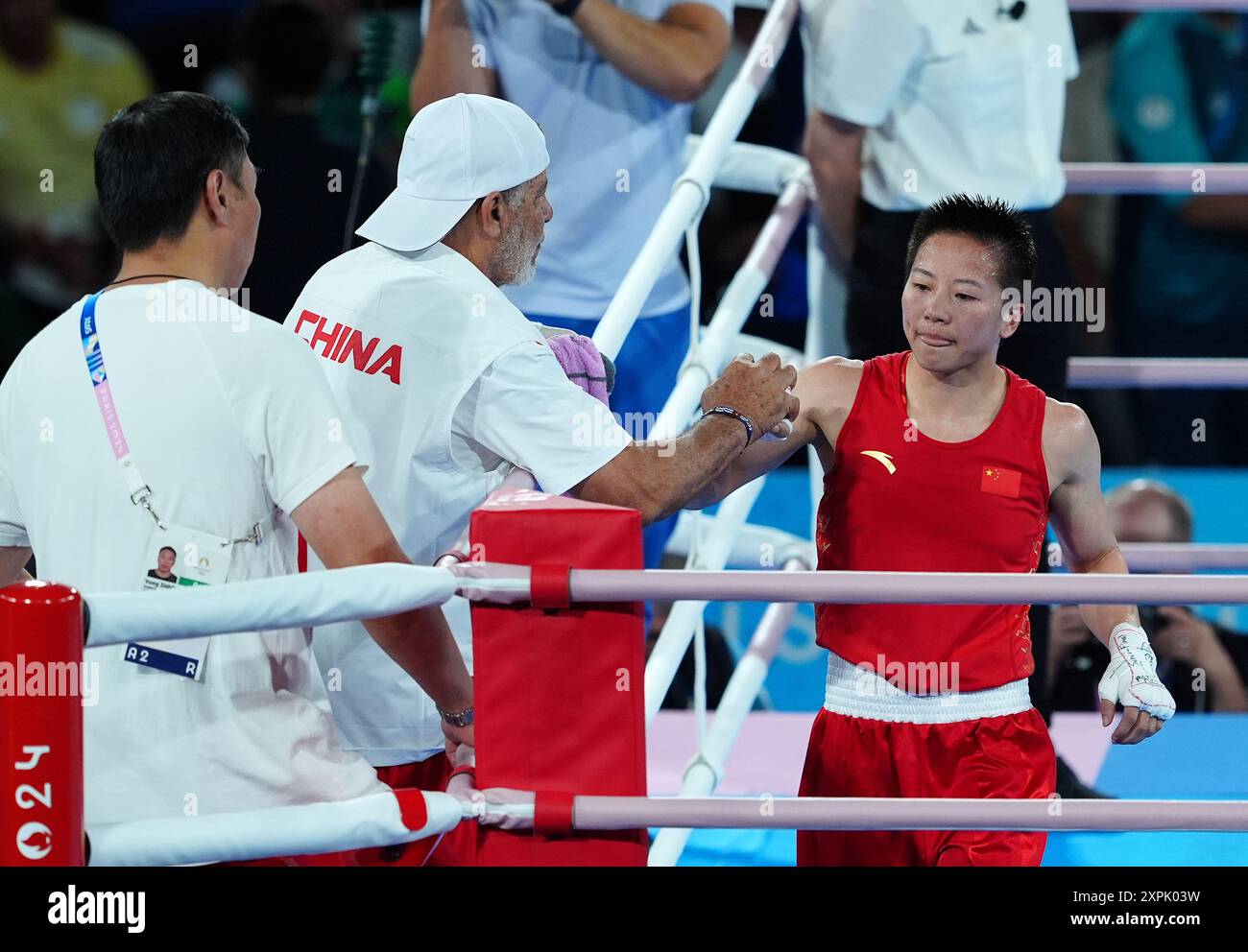 China’s Yu Wu celebrates victory over Kazakhstan’s Nazym Kyzaibay (not ...