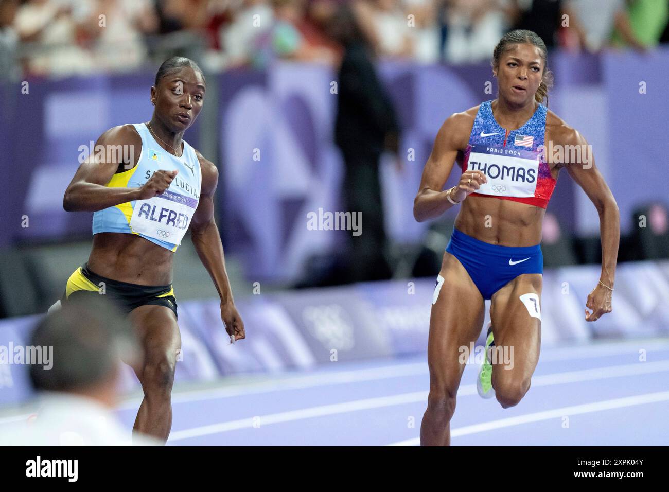 Gabrielle Thomas, of the United States, right, and Julien Alfred, of ...