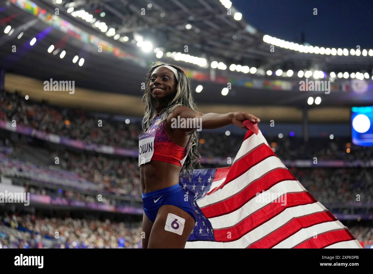 Brittany Brown, of the United States, celebrates winning the bronze ...