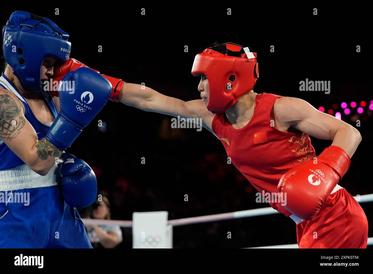 China's Wu Yu, right, fights Kazakhstan's Nazym Kyzaibay in their women ...