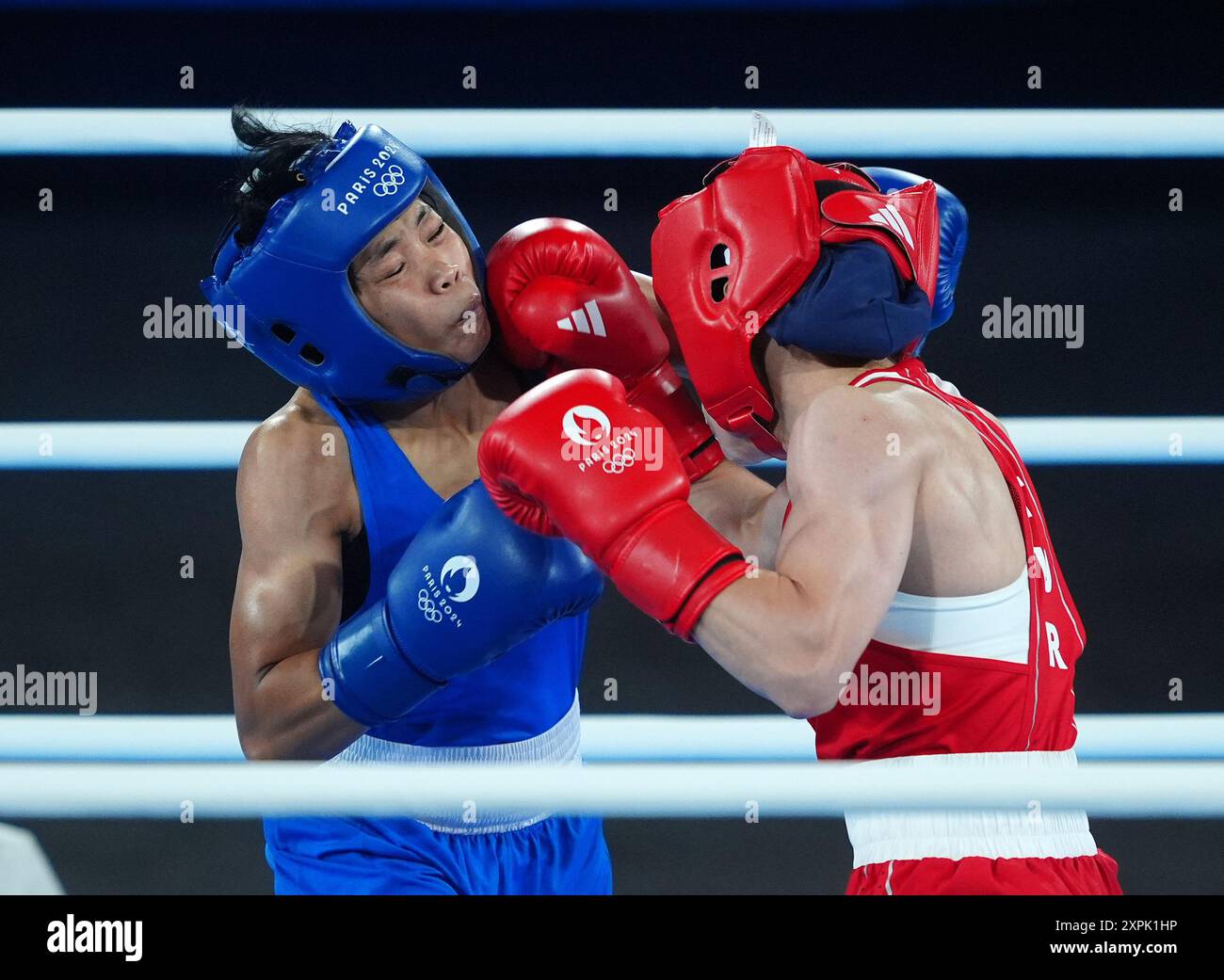 Philippines’ Aira Villegas (left) in action against Turkey’s Buse Naz ...