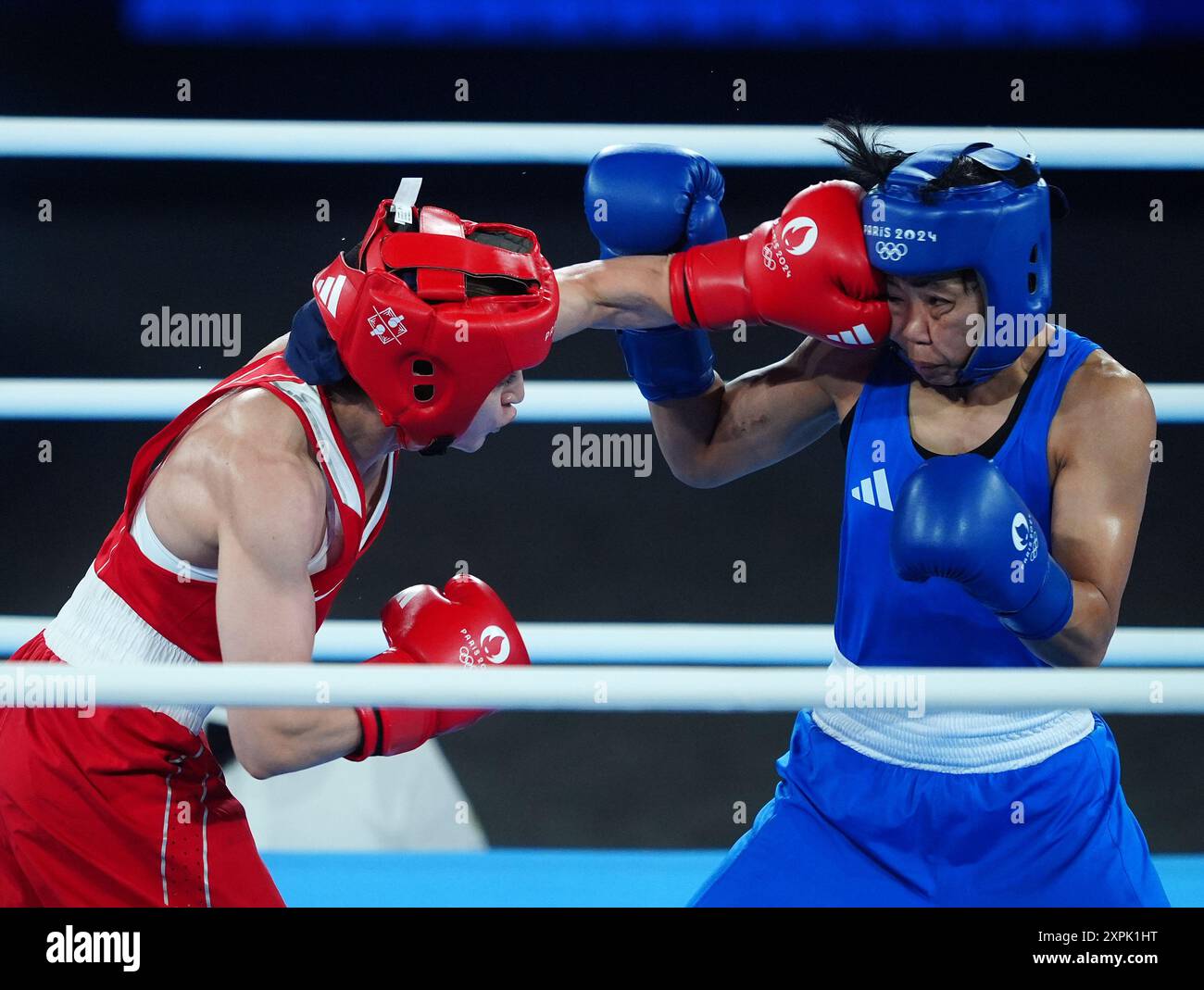 Philippines’ Aira Villegas (right) in action against Turkey’s Buse Naz ...