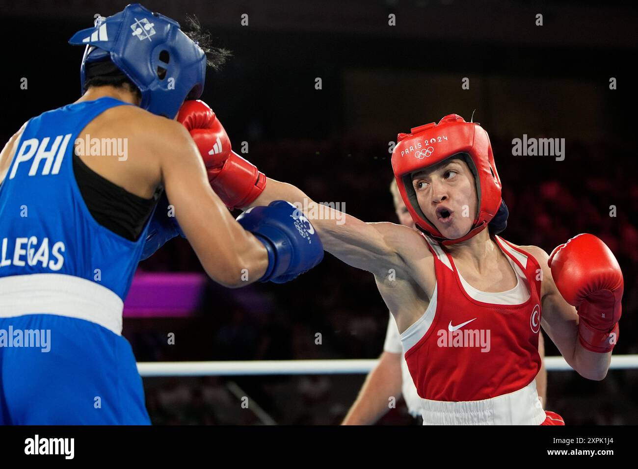 Turkey's Buse Naz Cakiroglu, right, fights Philippines' Aira Villegas ...