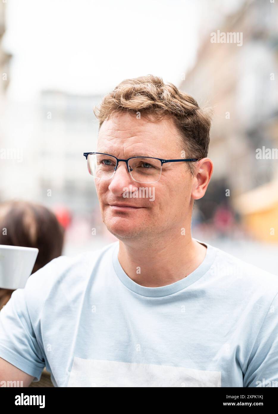 Portrait of a 45 yo white man drinking a cup of espresso coffee ...