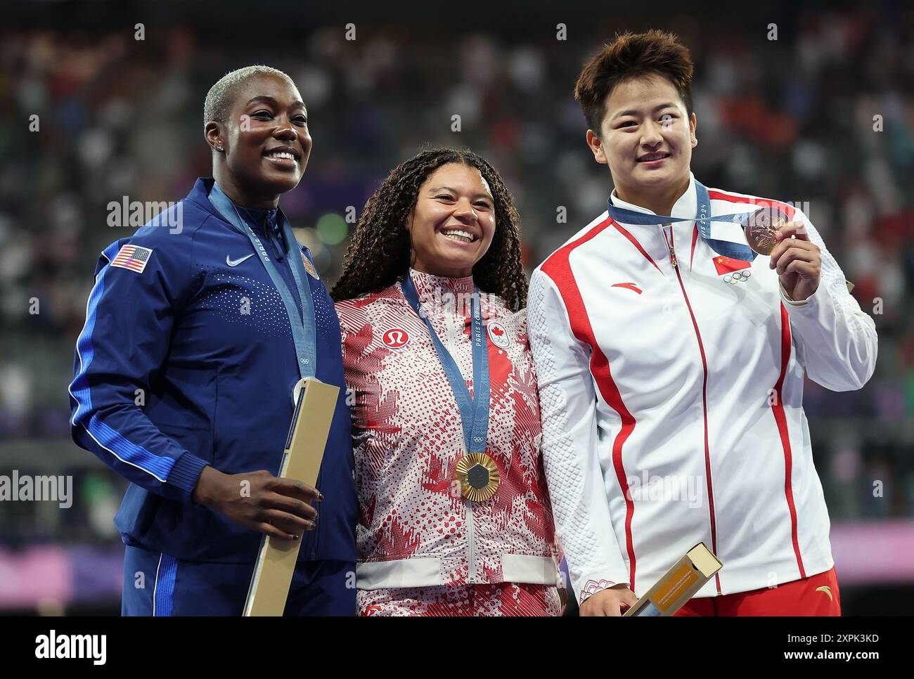 Paris, France. 6th Aug, 2024. Gold medalist Camryn Rogers (C) of Canada ...