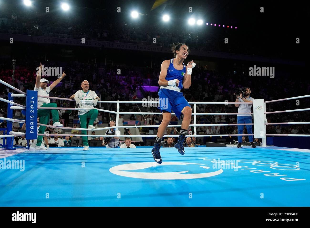 Algeria's Imane Khelif celebrates after defeating Thailand's Janjaem ...