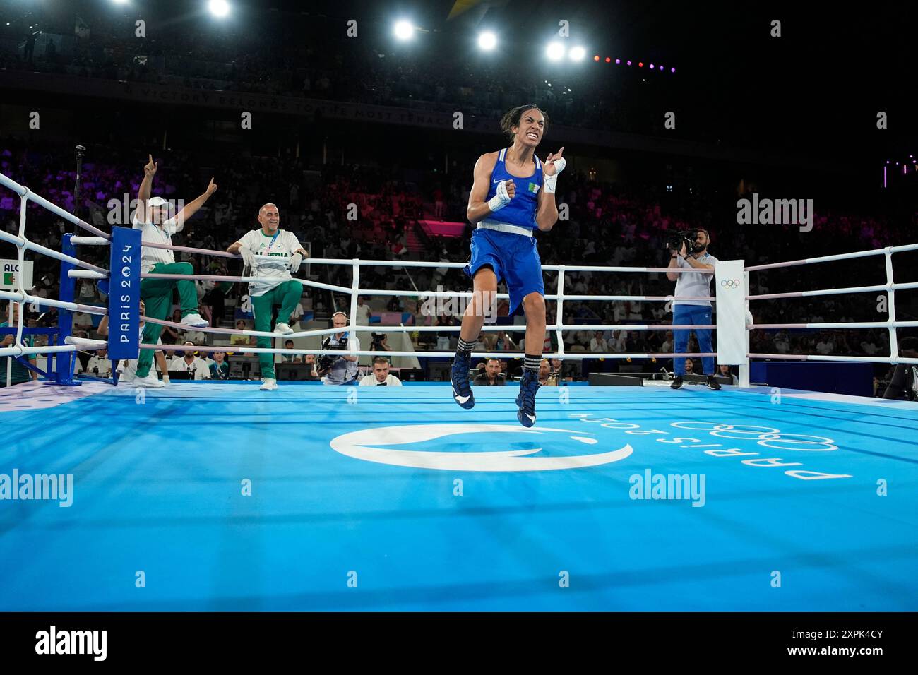 Algeria's Imane Khelif celebrates after defeating Thailand's Janjaem ...