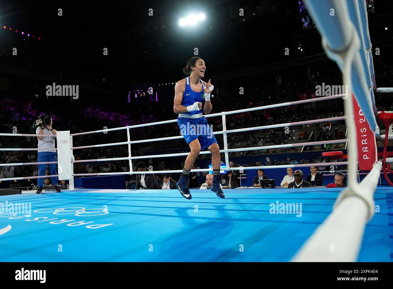 Algeria's Imane Khelif celebrates after defeating Thailand's Janjaem ...