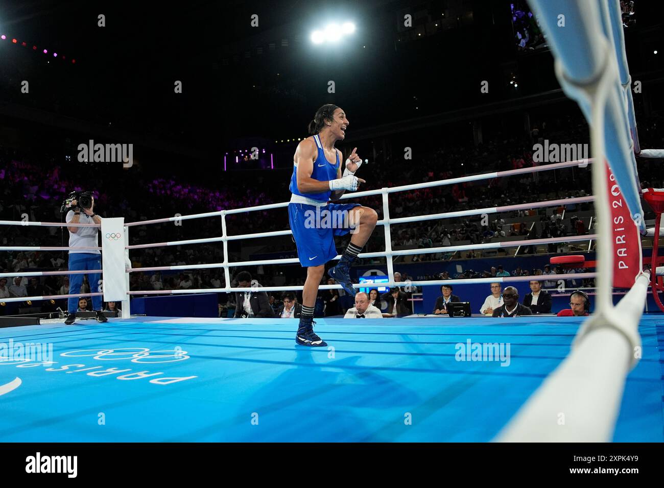 Algeria's Imane Khelif celebrates after defeating Thailand's Janjaem ...