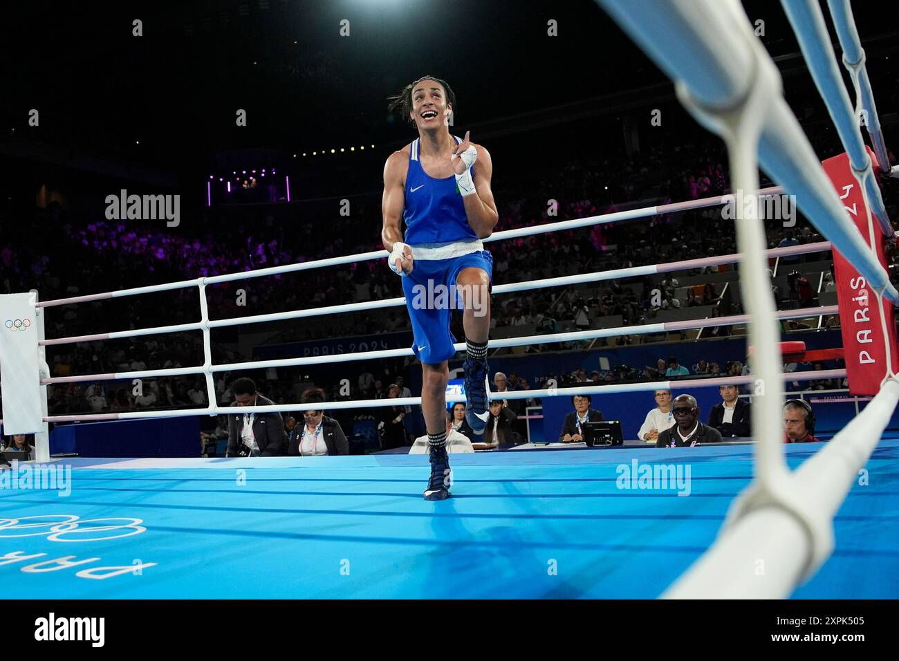 Algeria's Imane Khelif celebrates after defeating Thailand's Janjaem ...