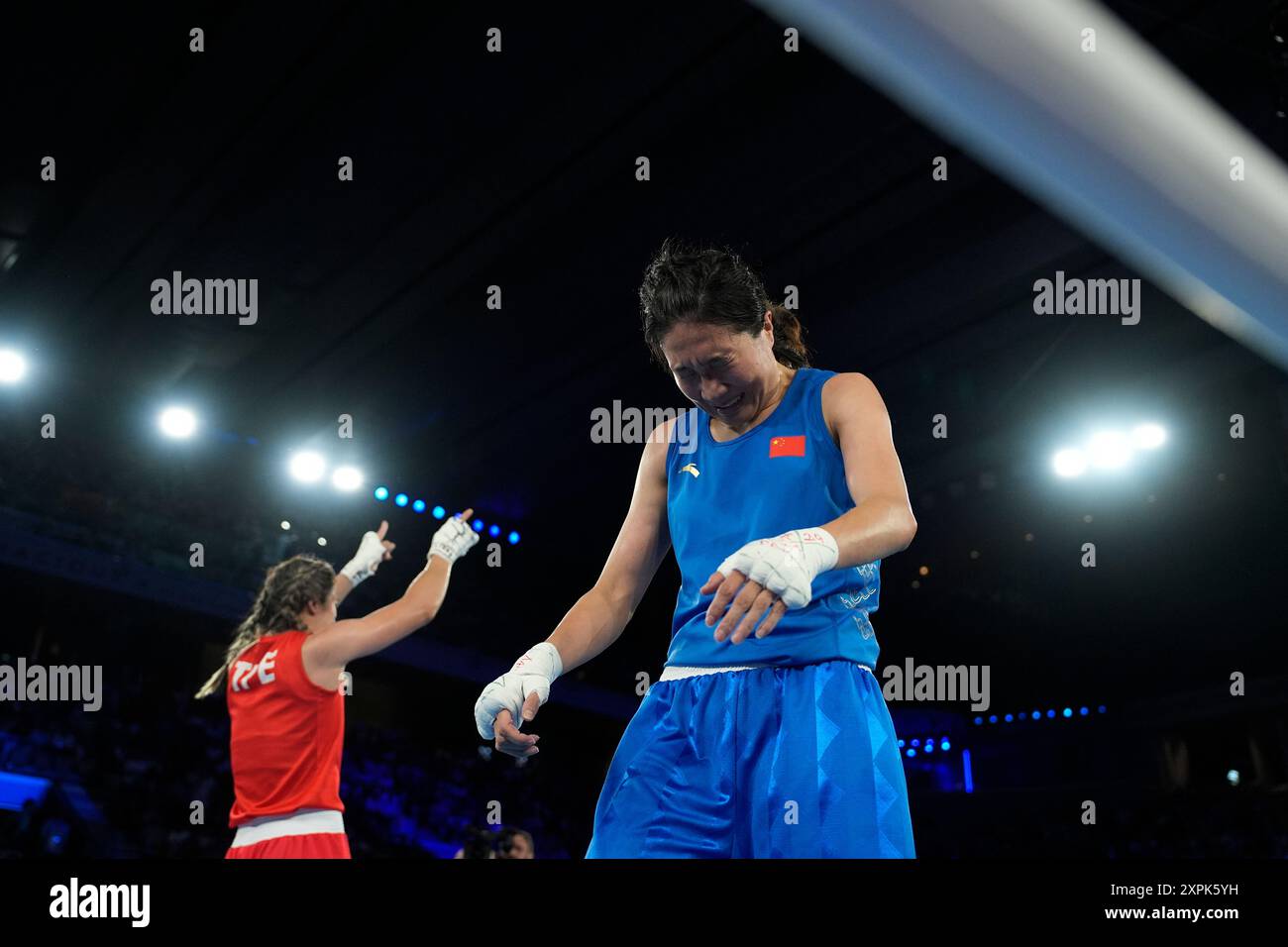 CORRECTS WINNER TO CHINA - China's Yang Liu, right, reacts to defeating ...