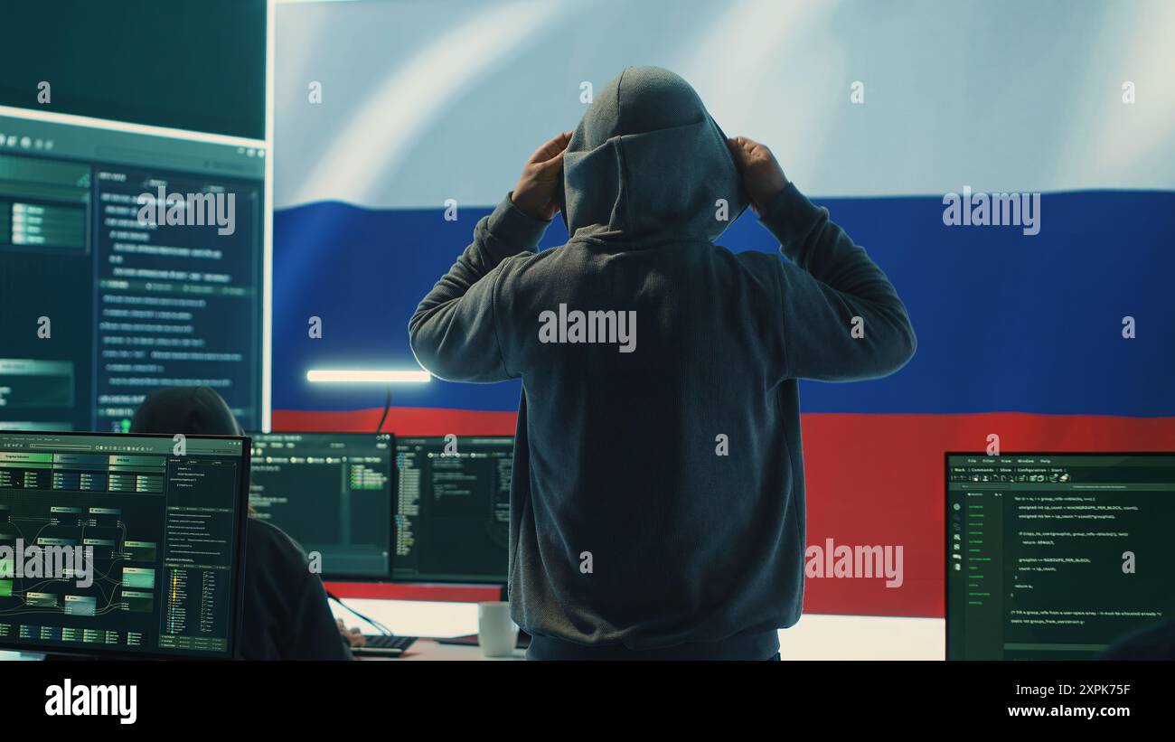 Russian Hacker With A Hood Installing Panic By Misconception And
