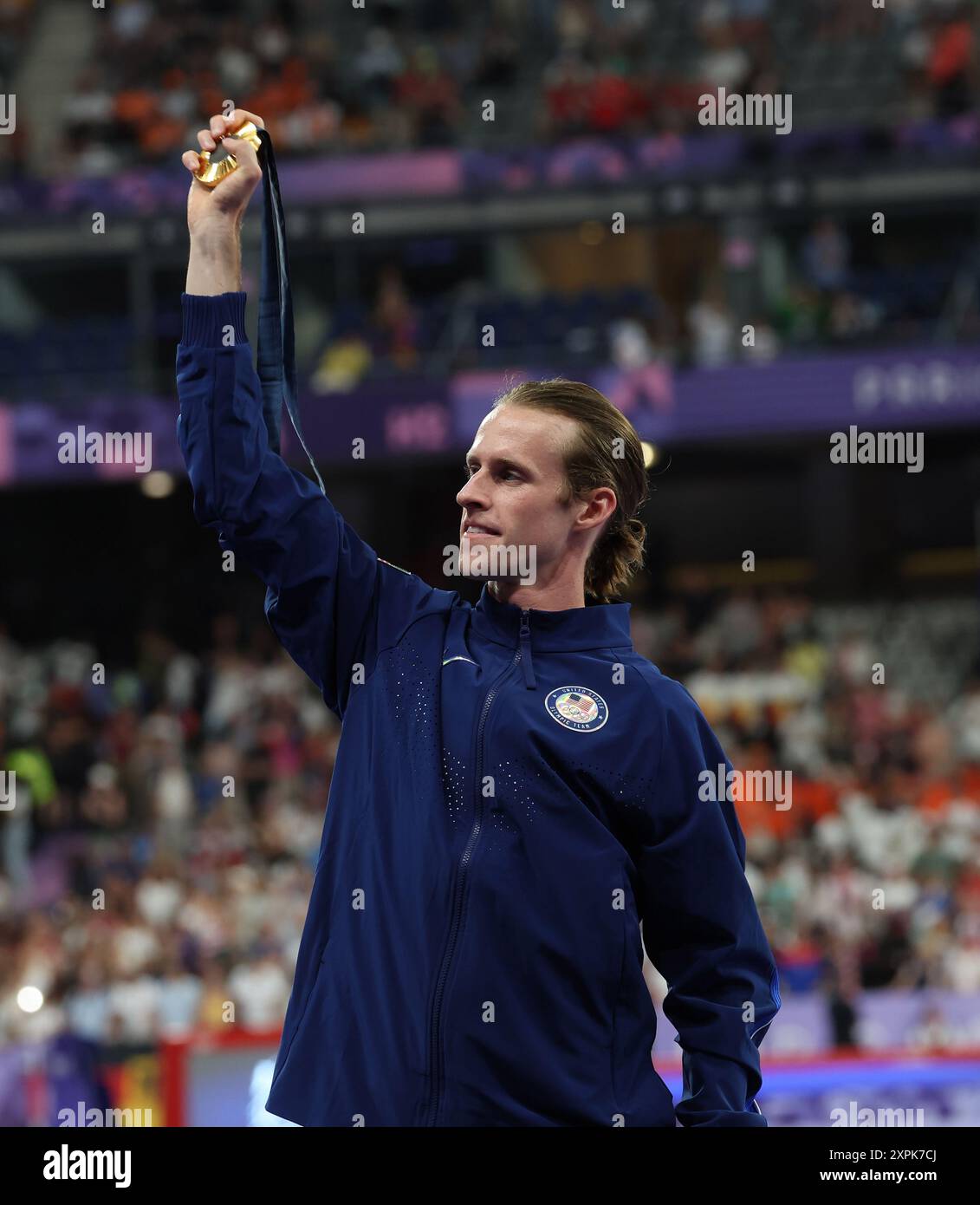 Paris, France. 06th Aug, 2024. USA's Cole Hocker holds his gold medal ...