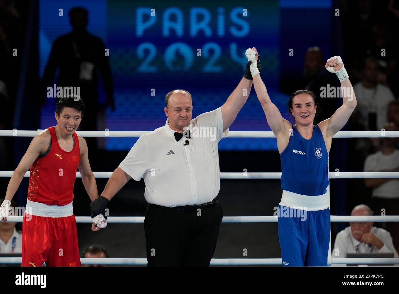 Ireland's Kellie Harrington, right, celebrates winning gold after ...