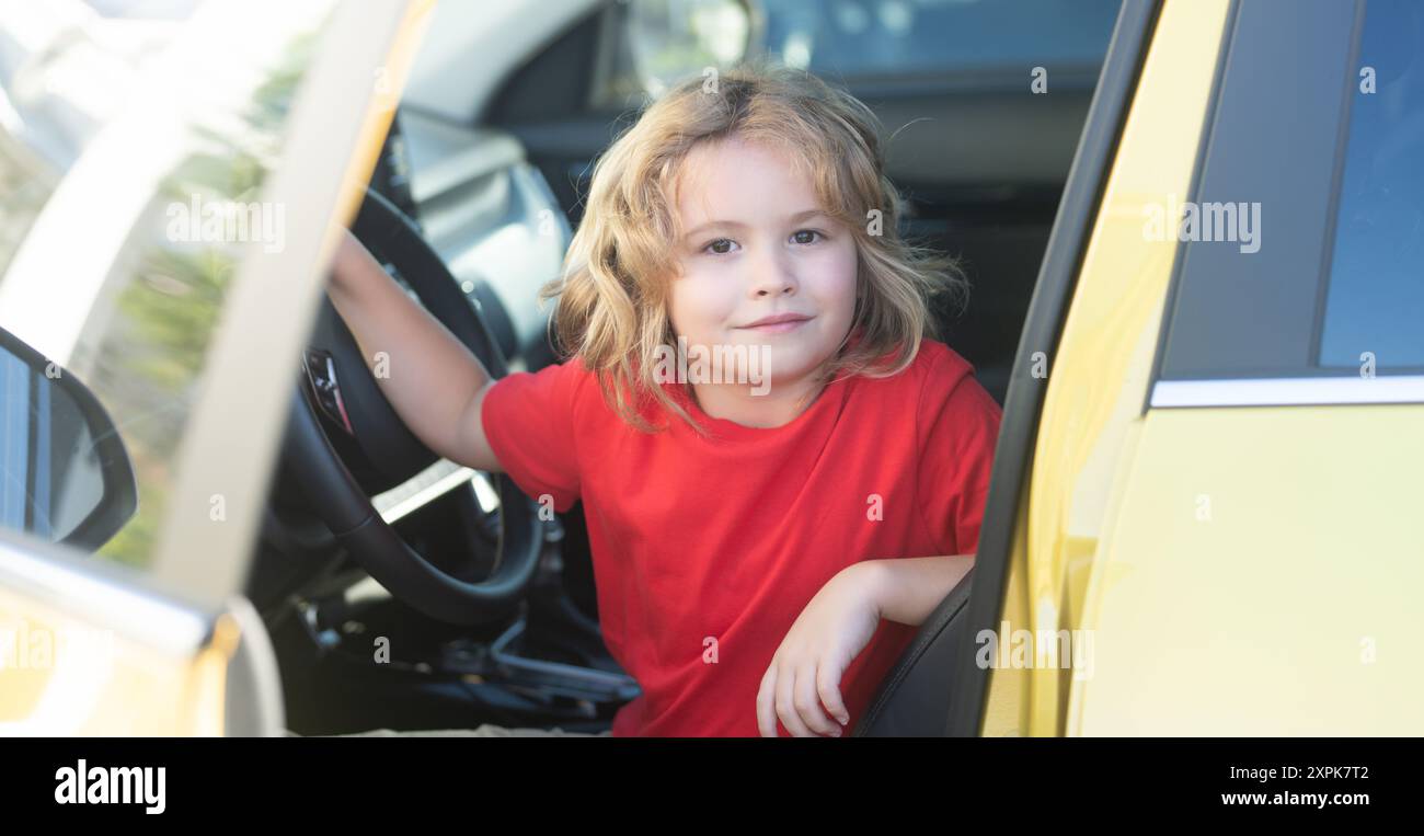 Kid Driver. Cute little boy pretending to drive. Kid in car with his ...