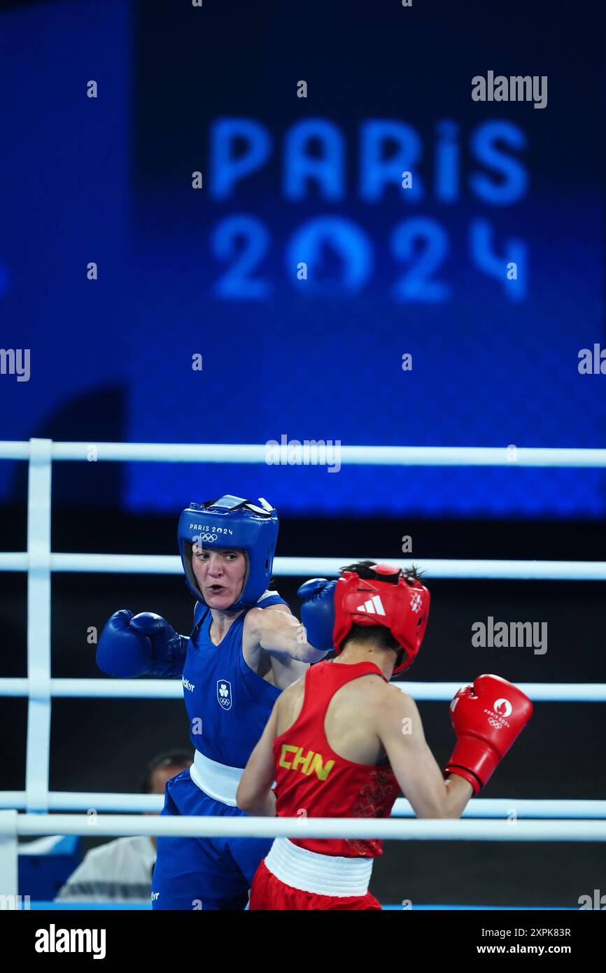 Ireland’s Kellie Harrington (left) in action against China’s Wenlu Yang ...