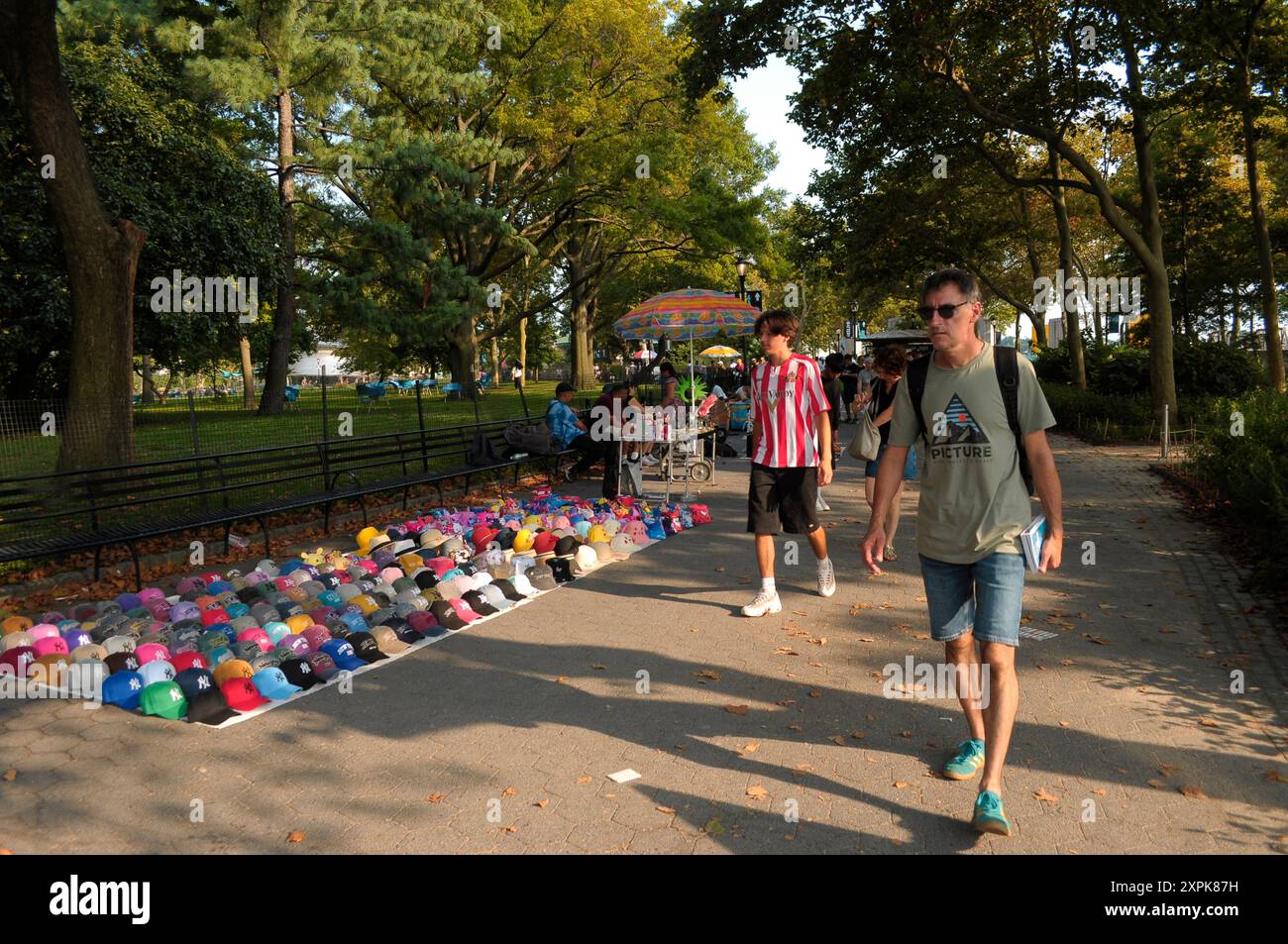 People walk in Battery Park in Manhattan, New York City Stock Photo - Alamy