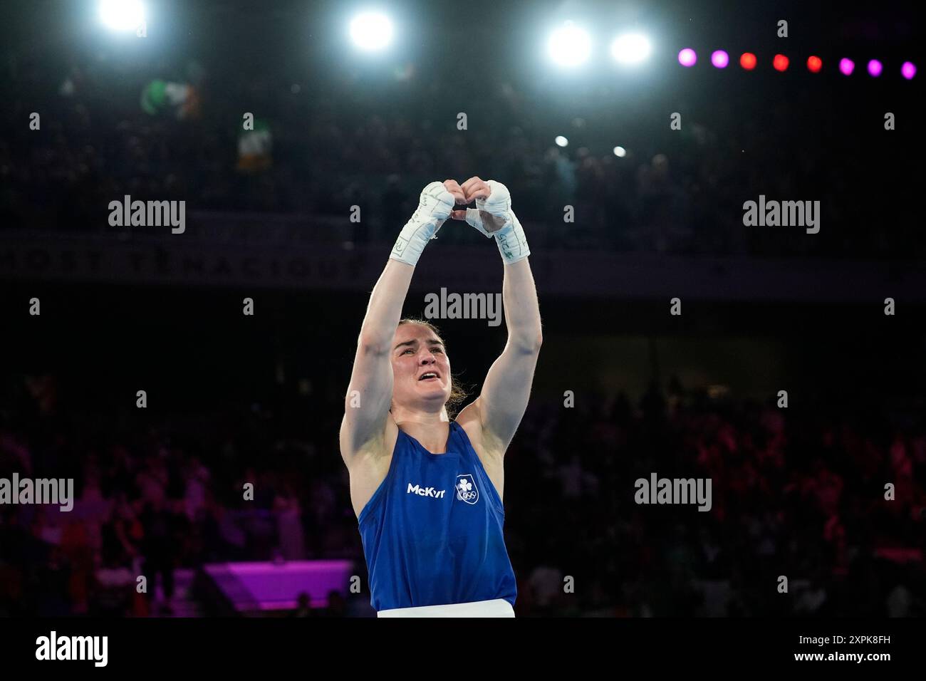Ireland's Kellie Harrington gestures as she celebrates winning gold ...