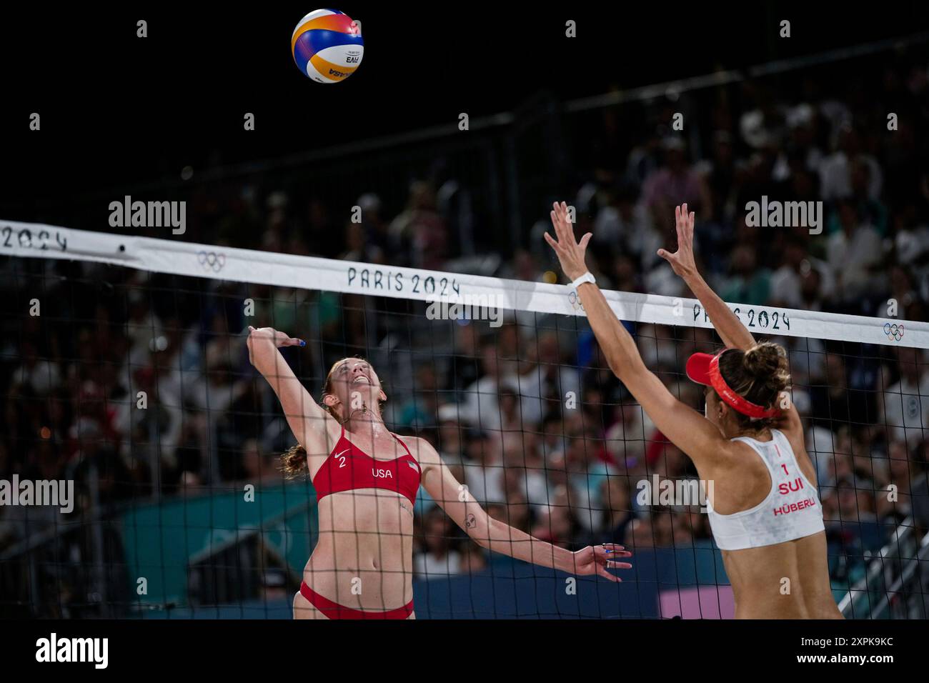 US' Kelly Cheng hits the ball during the women's quarterfinal beach ...