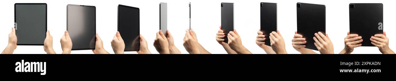 Big tablet hold in hands side rear front view isolated on studio background Stock Photo - Alamy