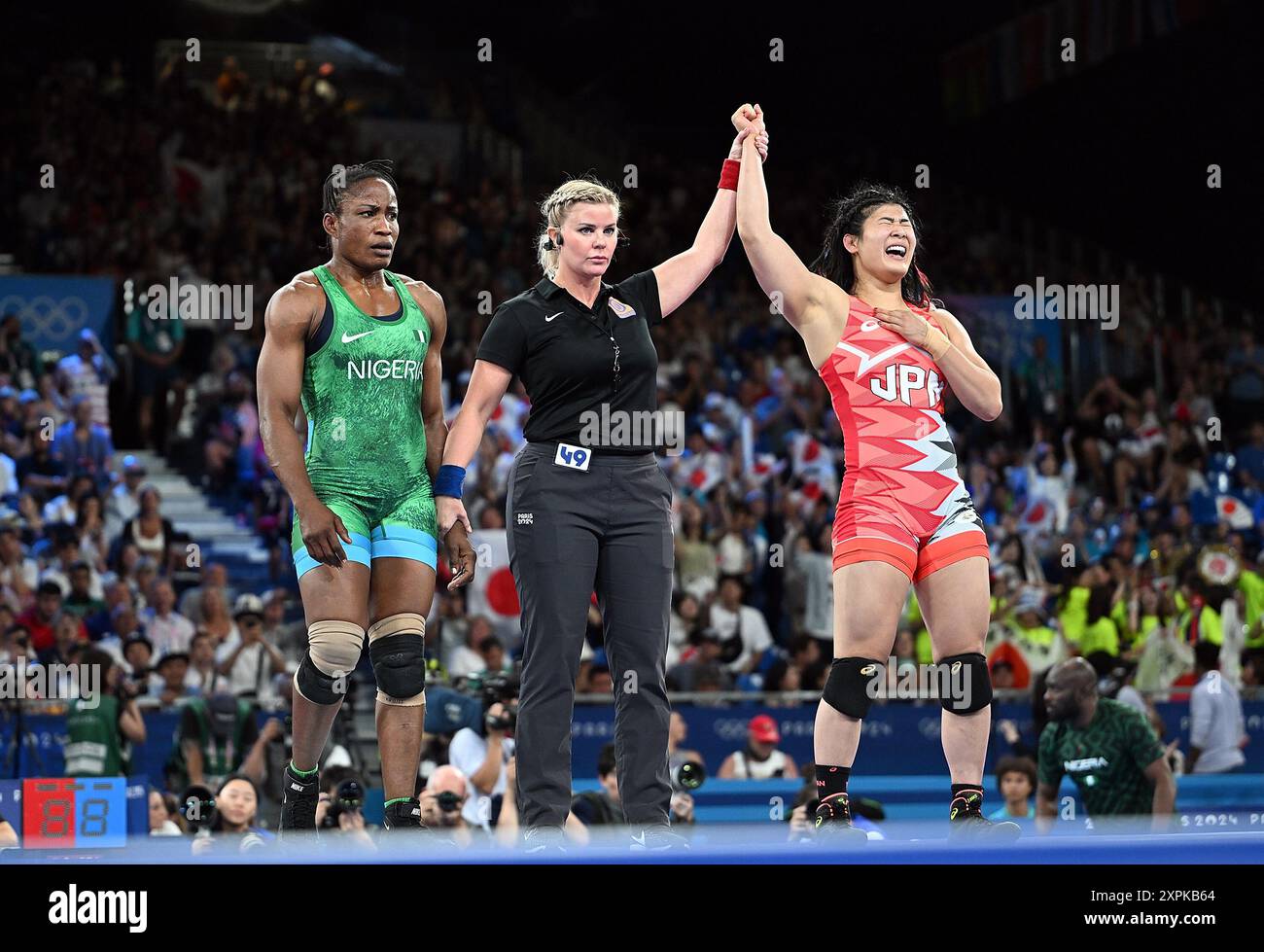 Paris, France. 6th Aug, 2024. Ozaki Nonoka (R) of Japan has her hand ...