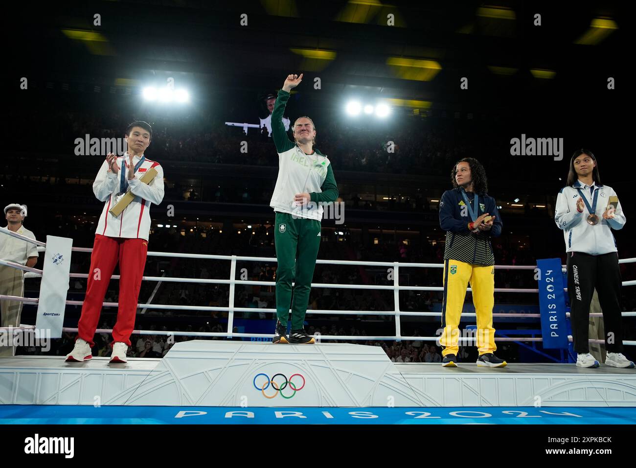 Silver medalist China's Yang Wenlu, left, and bronze medalists Taiwan's ...