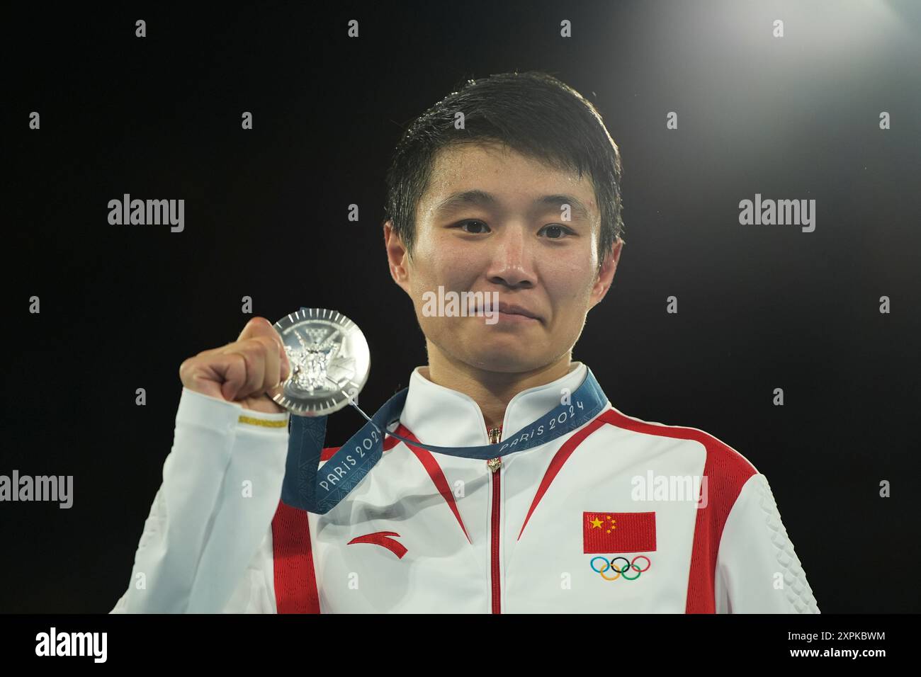 Silver medalist China's Yang Wenlu poses during a medals ceremony for ...