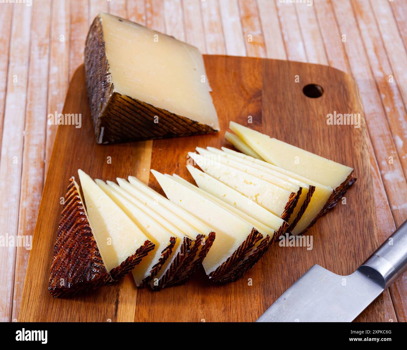 Hard cheese cut slices knife hi-res stock photography and images - Alamy