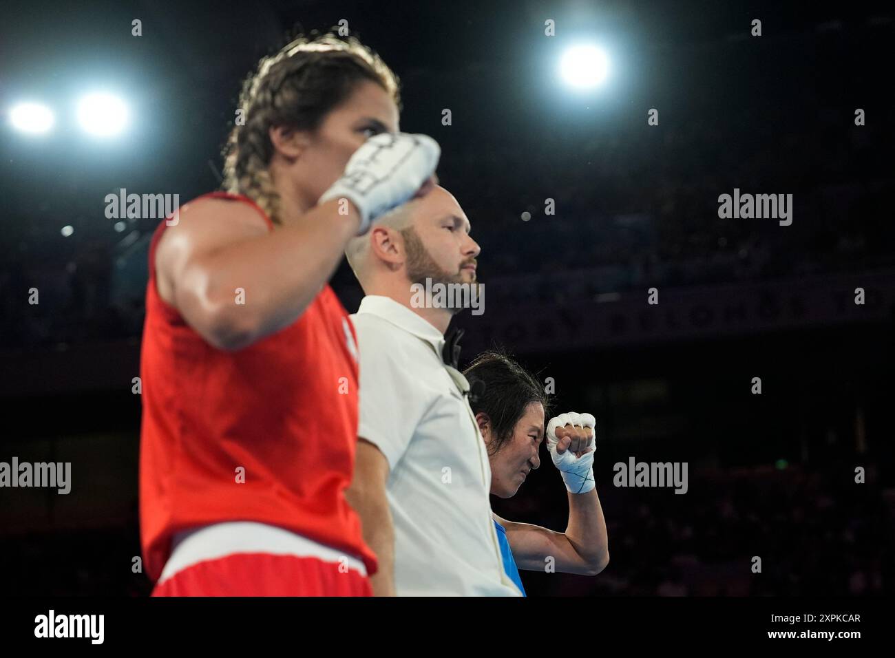 China's Yang Liu, right, reacts after defeating Taiwan's Chen Nien-chin ...