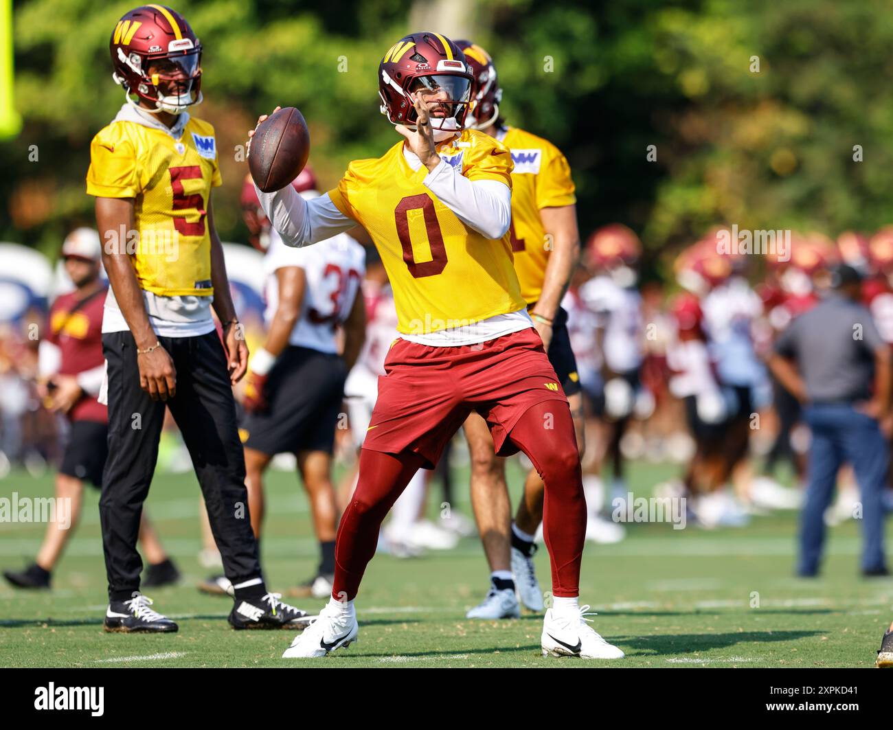 Washington Commanders quarterback Marcus Mariota (0) performing drills ...