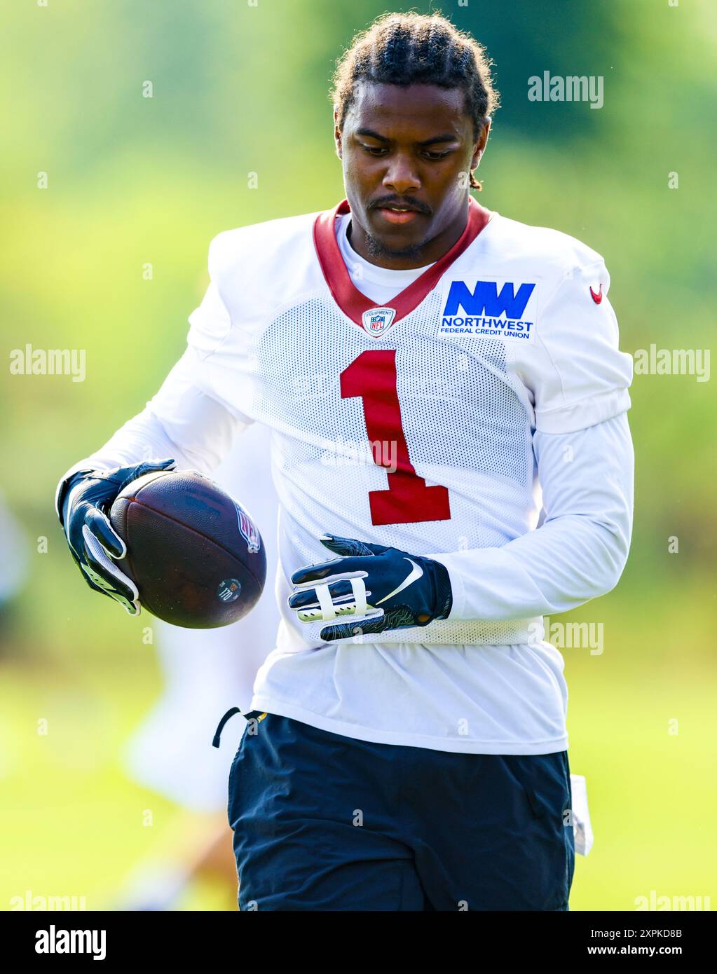 Washington Commanders wide receiver Jahan Dotson (1) playing catch ...