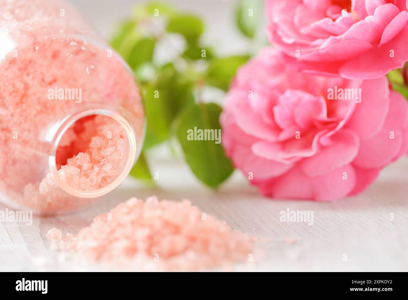 Rose salt with rose extract.spa salts in glass jars and pink roses ...