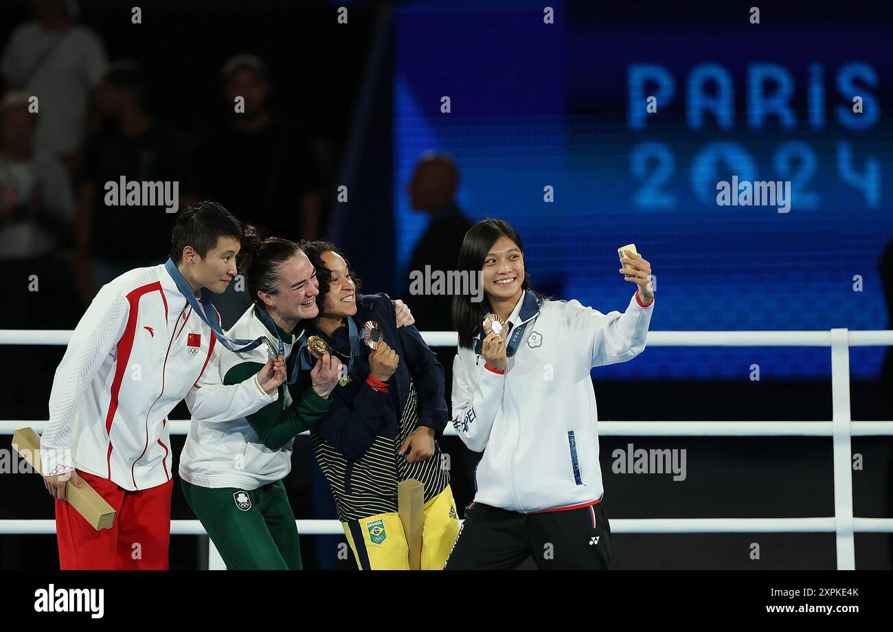 Paris, France. 6th Aug, 2024. Gold medalist Kellie Harrington (2nd L ...