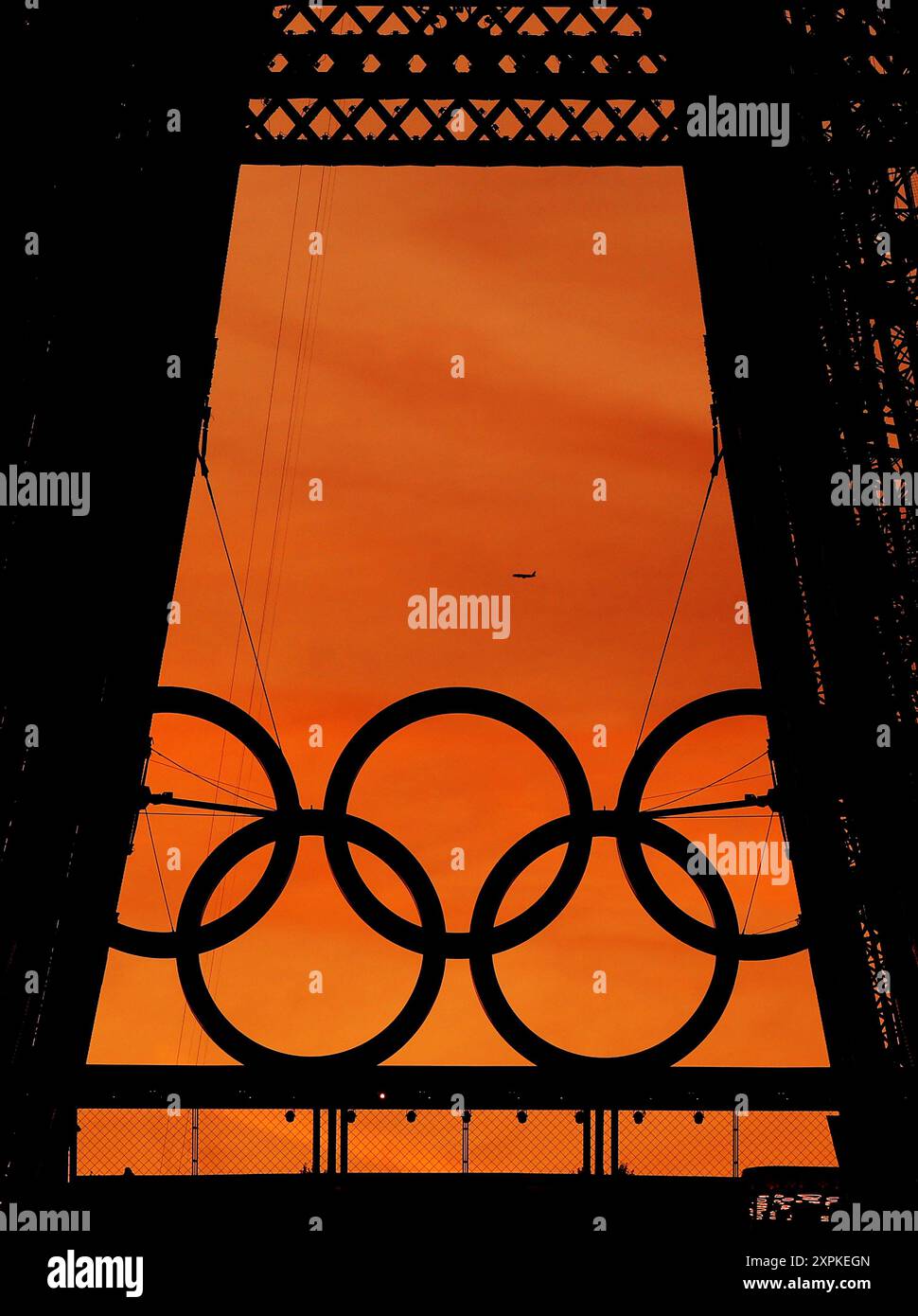 Paris, France. 6th Aug, 2024. Silhouettes of a plane and the Olympic ...