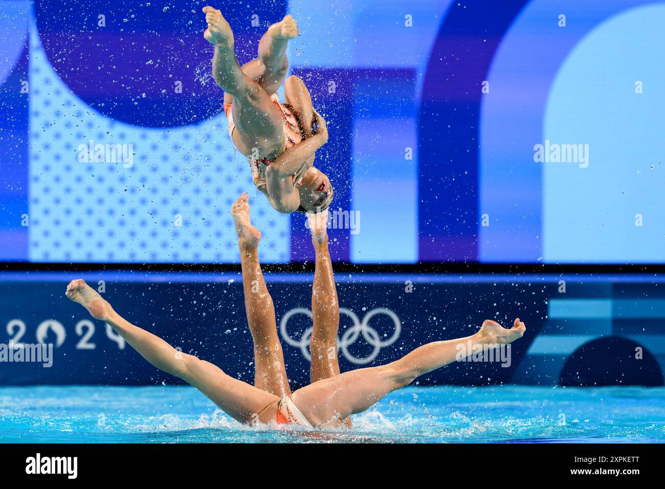 Athletes of team France compete in the artistic swimming Team Free ...