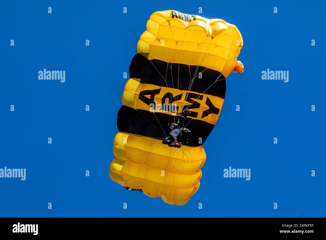 A member of the U.S. Army Parachute Team, the Golden Knights perform a ...