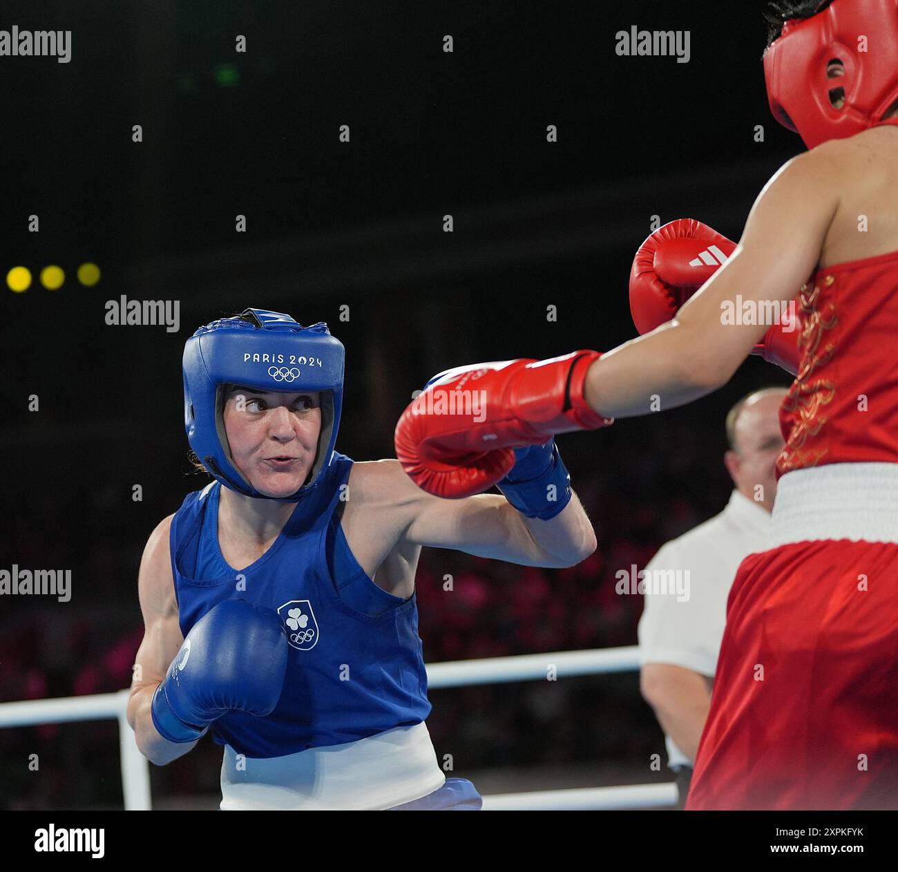 Paris, France. 6th Aug, 2024. Kellie Harrington (in blue) of Ireland ...