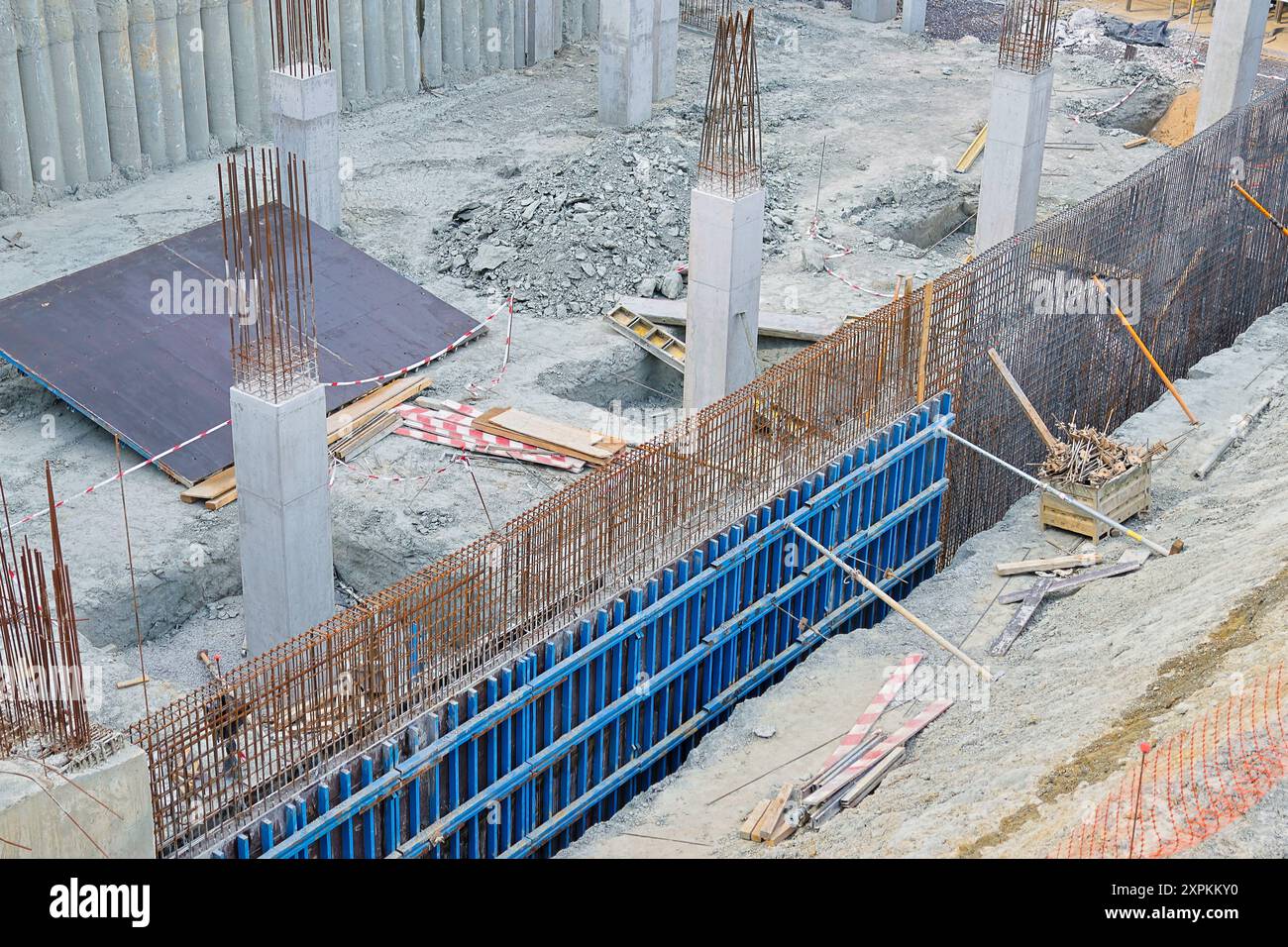 Overhead view of construction site showcasing foundation work with ...
