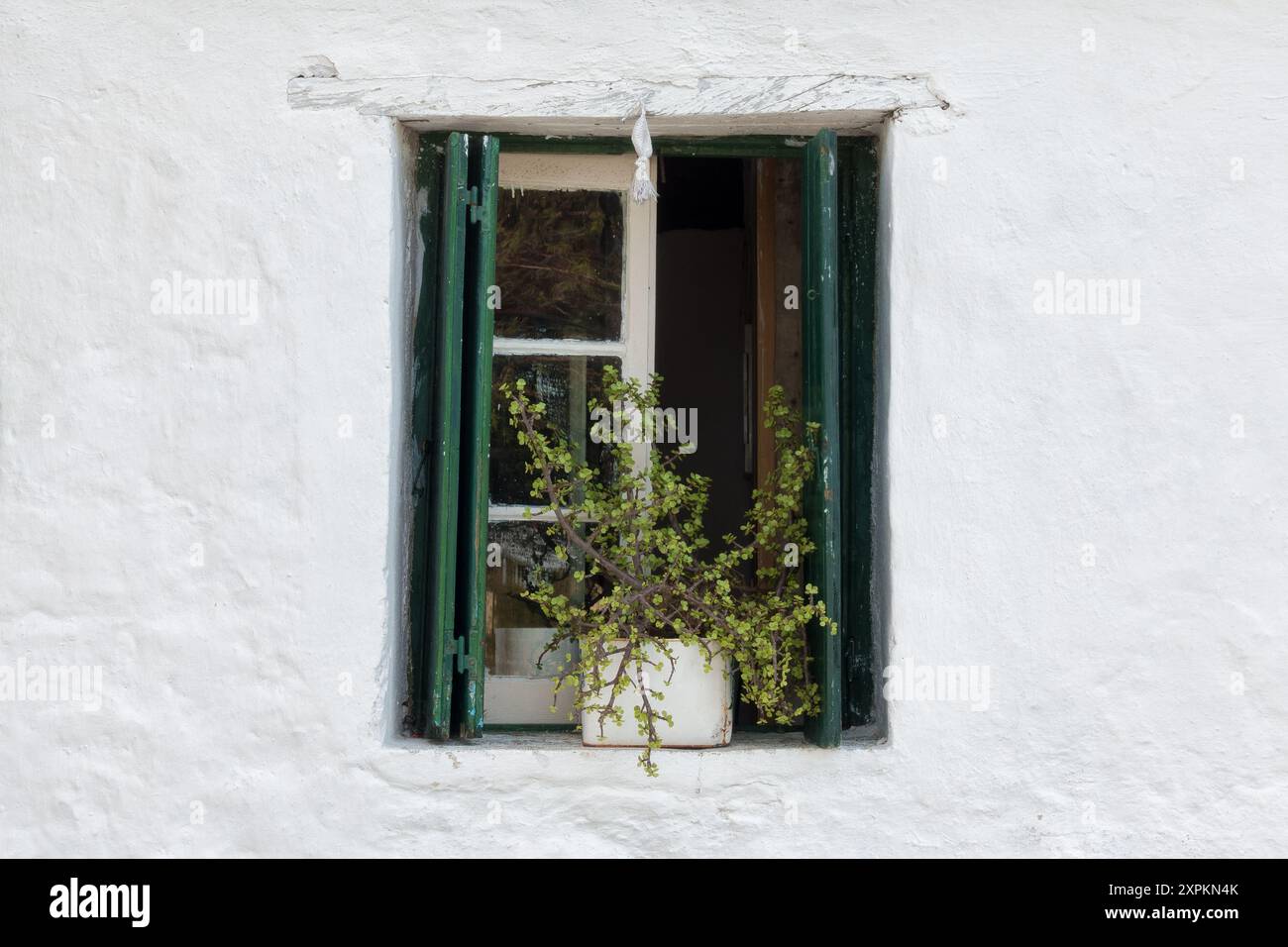 The window of an old house in Othonoi island, Greece Stock Photo - Alamy