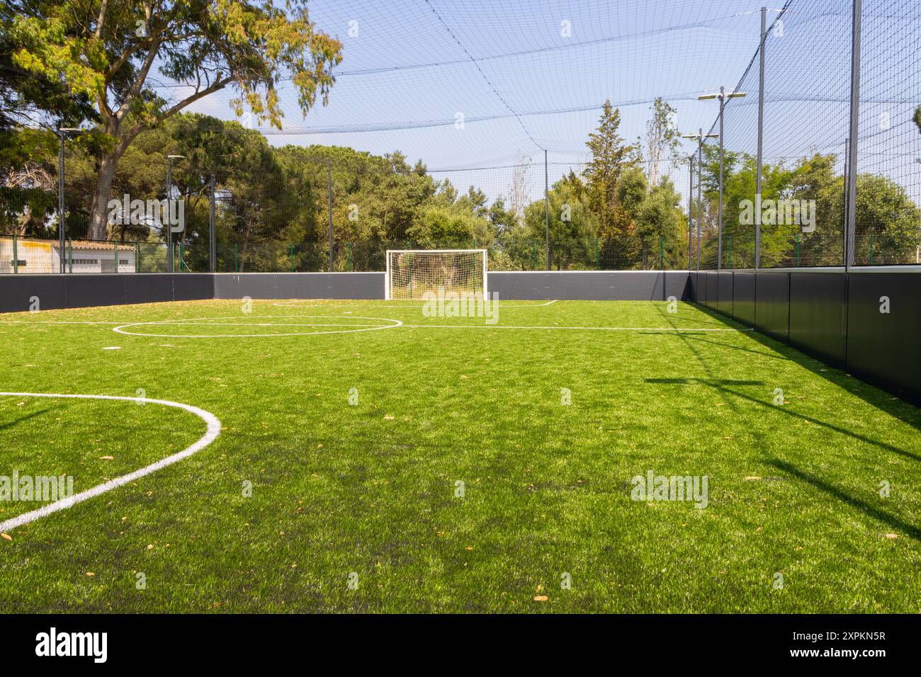 Modern synthetic grass soccer field with goalposts at the lisbon ...