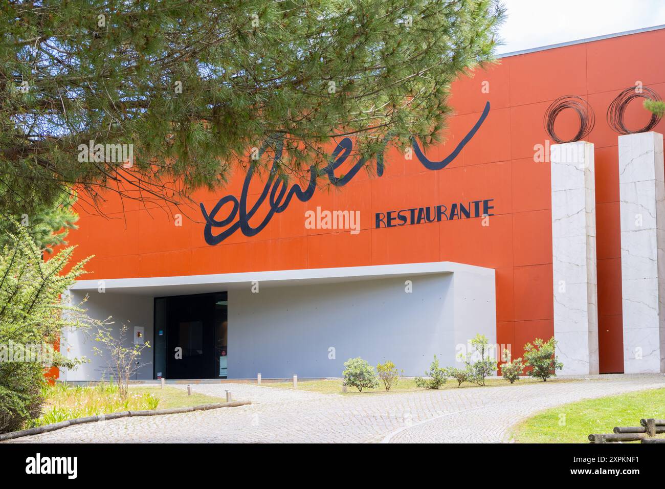 Orange facade of the eleven restaurant with modern architecture in ...