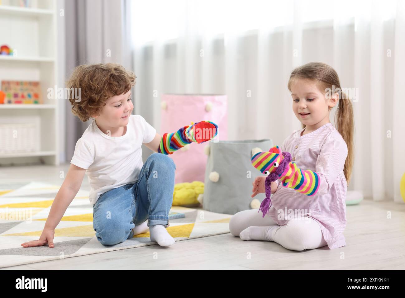 Children playing with puppets hi-res stock photography and images - Alamy