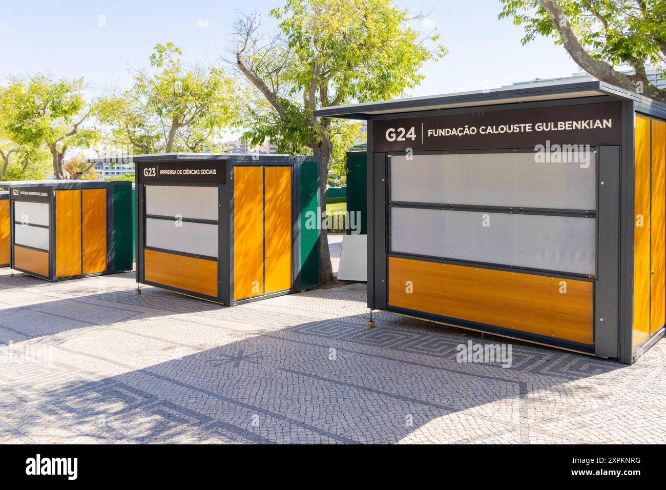 Empty book fair booths bathed in sunlight, ready to welcome exhibitors ...